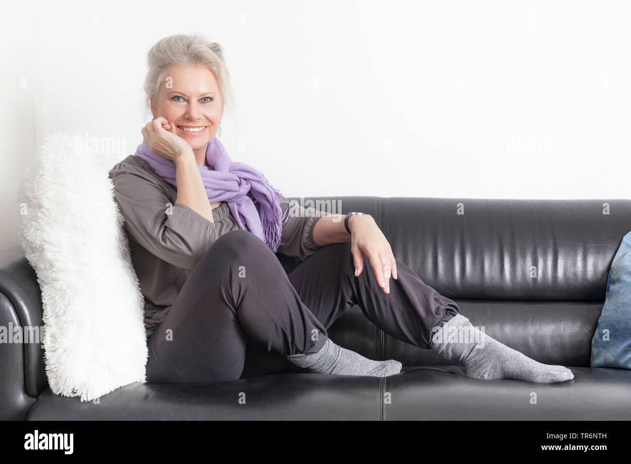 Contentedly hi-res stock photography and images - Alamy