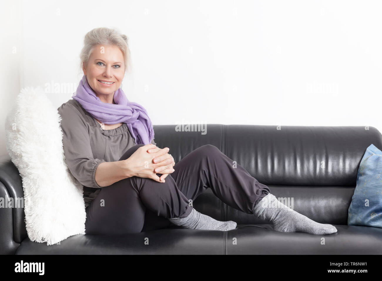 Contentedly hi-res stock photography and images - Alamy