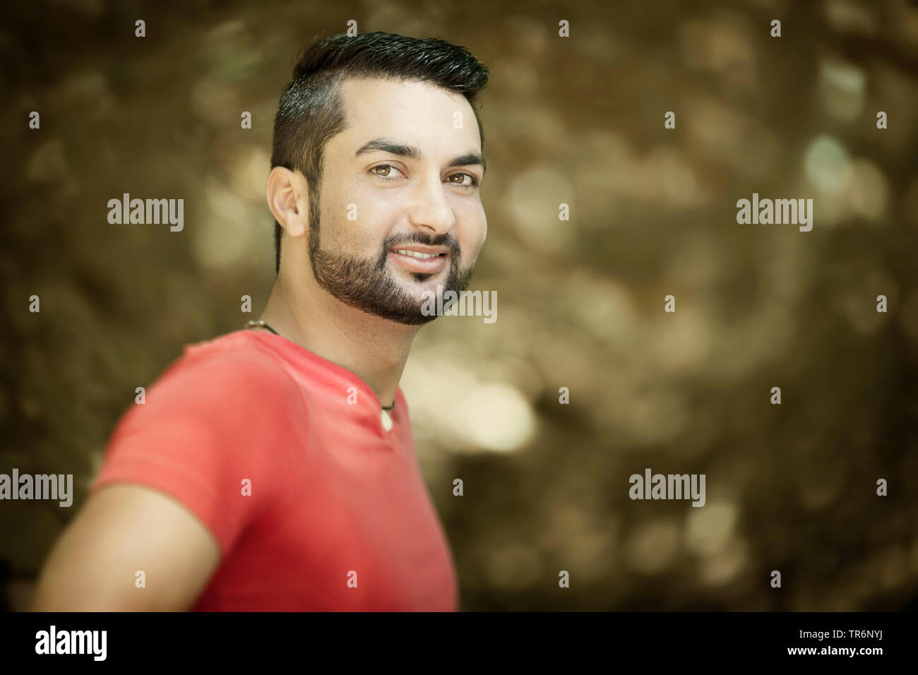 young Indian man in nature, Germany Stock Photo - Alamy