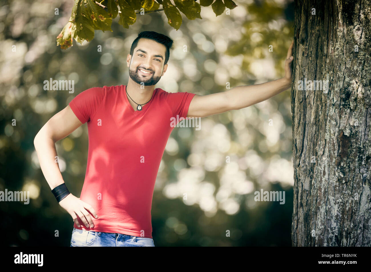 young Indian man in nature, Germany Stock Photo - Alamy
