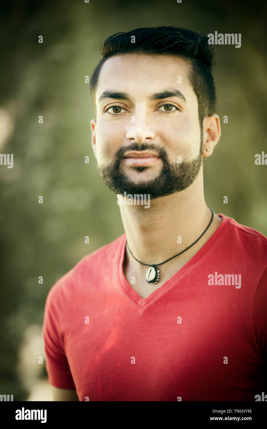 young Indian man in nature, Germany Stock Photo - Alamy