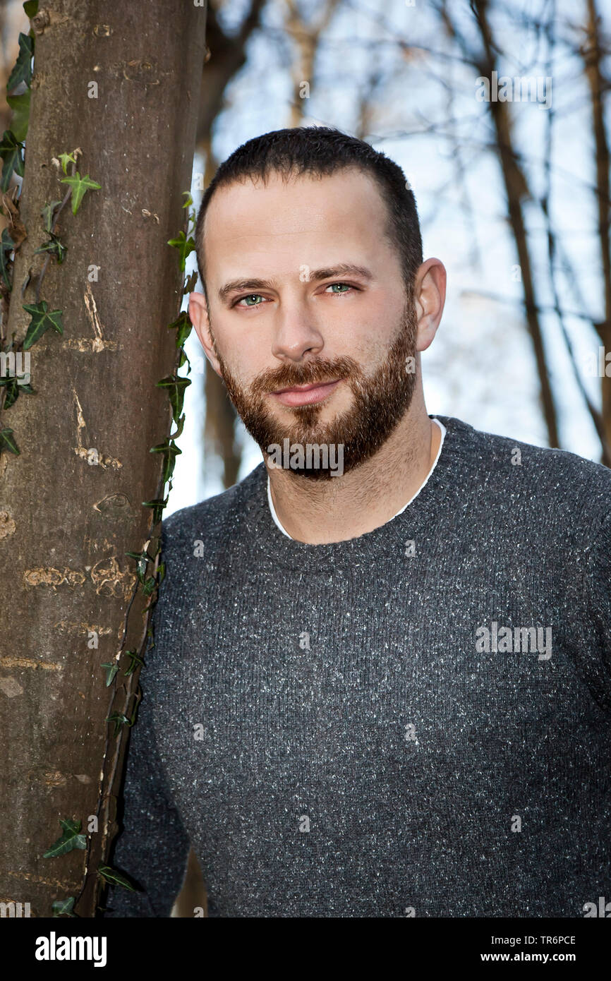 Handsome man in nature hi-res stock photography and images - Alamy