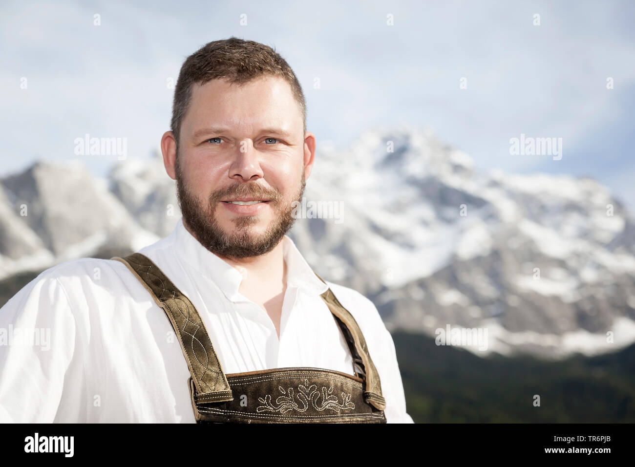 nice good looking man in Bavarian traditional clothing in front of the ...