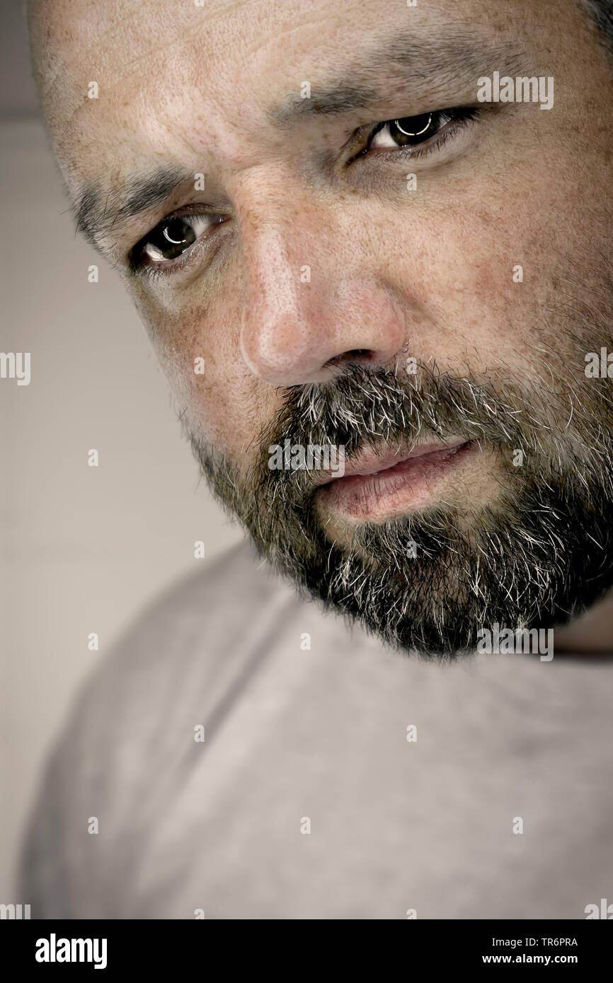 Melancholic expression hi-res stock photography and images - Alamy