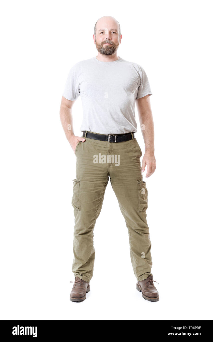 standing man with frontal baldness and beard in front of white ...