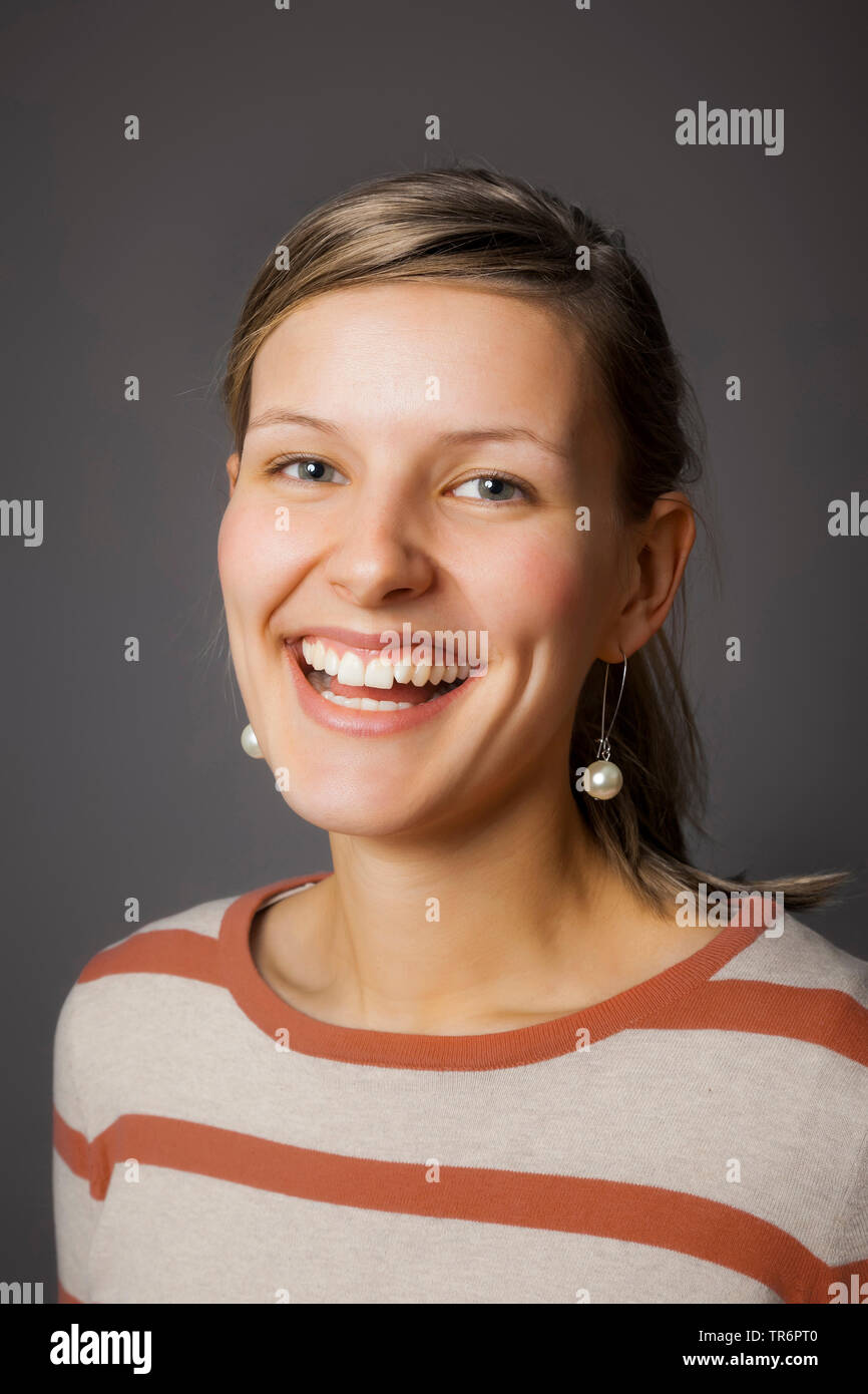 portrait of a laughing good looking woman, Germany Stock Photo - Alamy