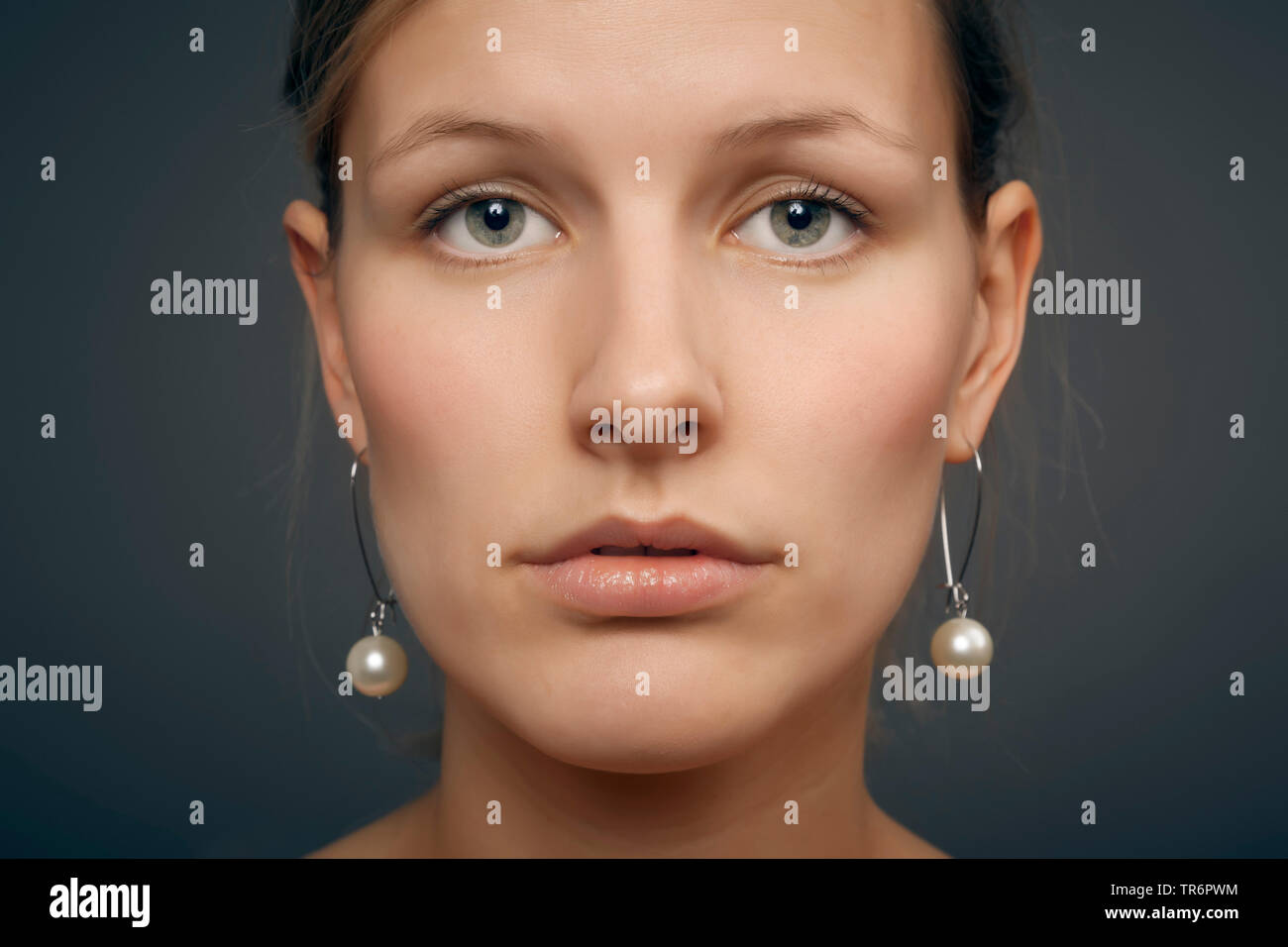portrait of a serious good looking woman, Germany Stock Photo - Alamy