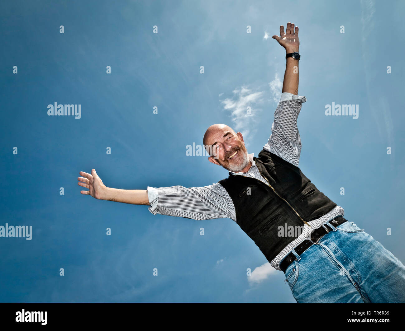 old man with a grey beard cheering, Germany Stock Photo - Alamy