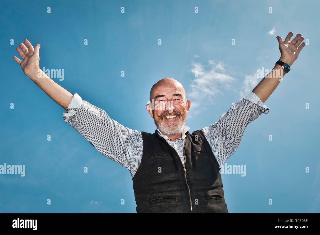 old man with a grey beard cheering, Germany Stock Photo - Alamy