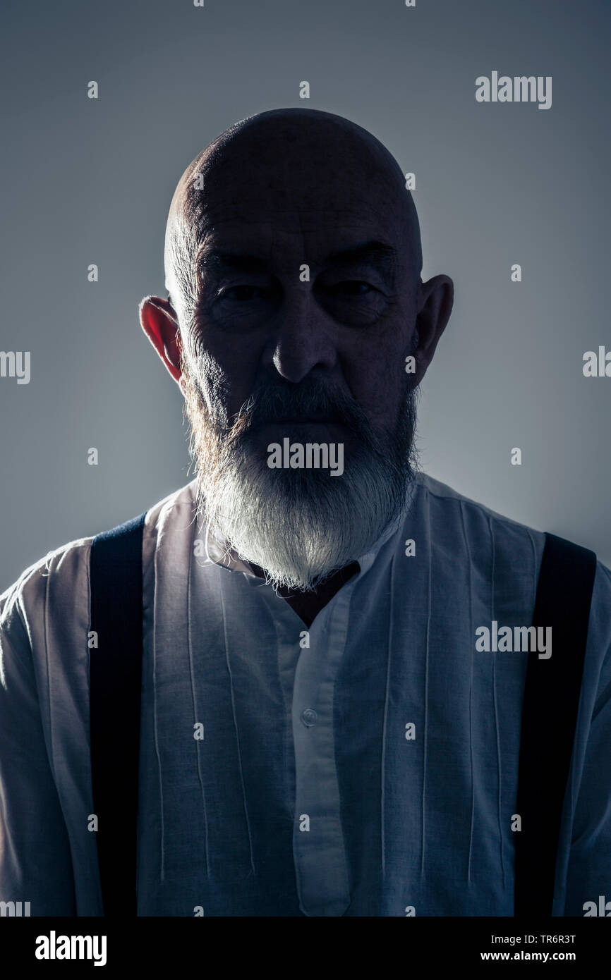 old serious man with a grey beard, Germany Stock Photo - Alamy