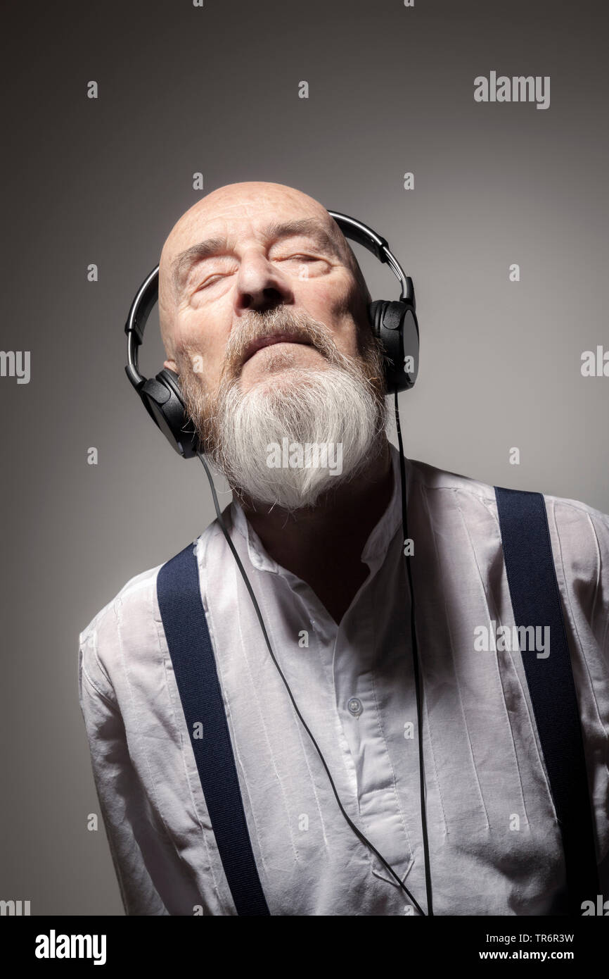 Bald headed man with music hi-res stock photography and images - Alamy