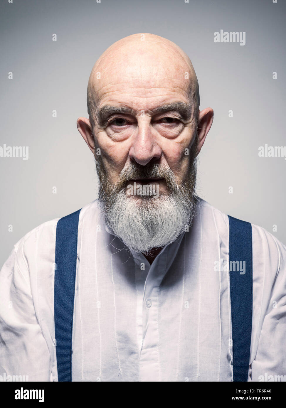 old serious man with a grey beard, Germany Stock Photo - Alamy