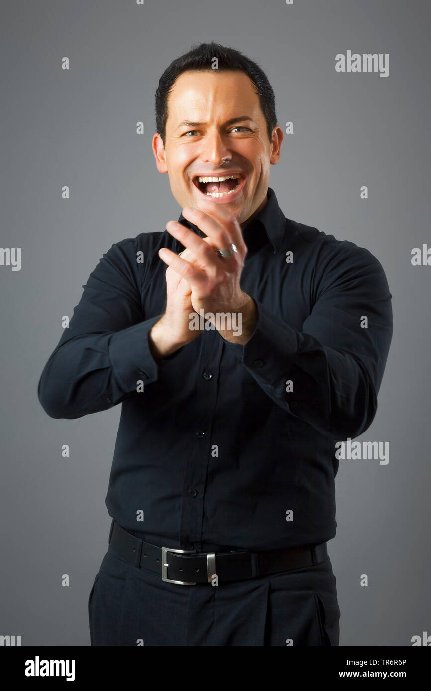 man in black is happy, Germany Stock Photo - Alamy