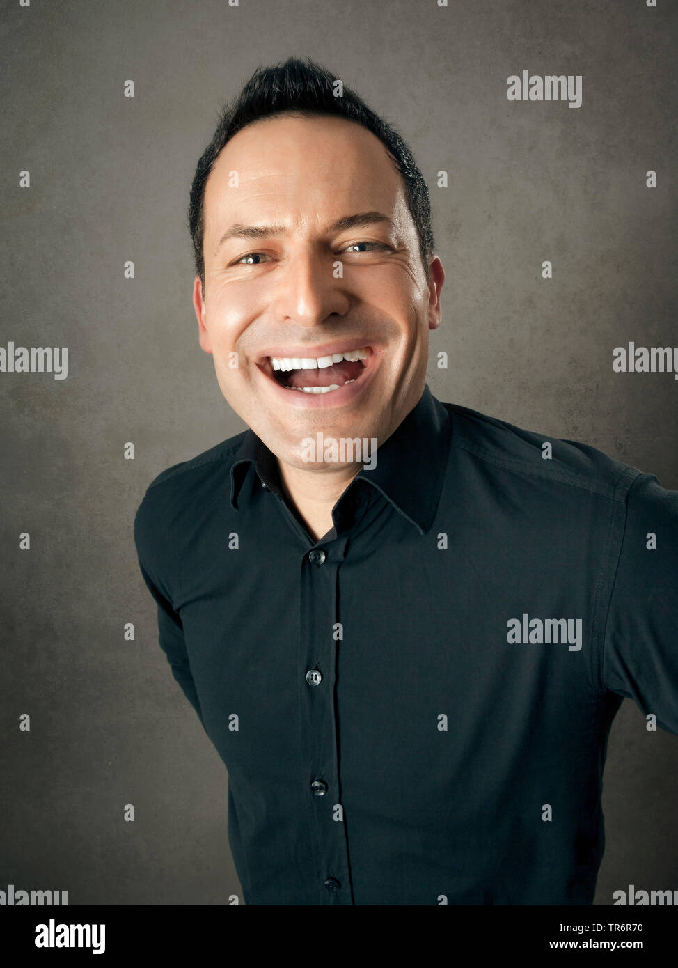 man in black is happy, Germany Stock Photo - Alamy