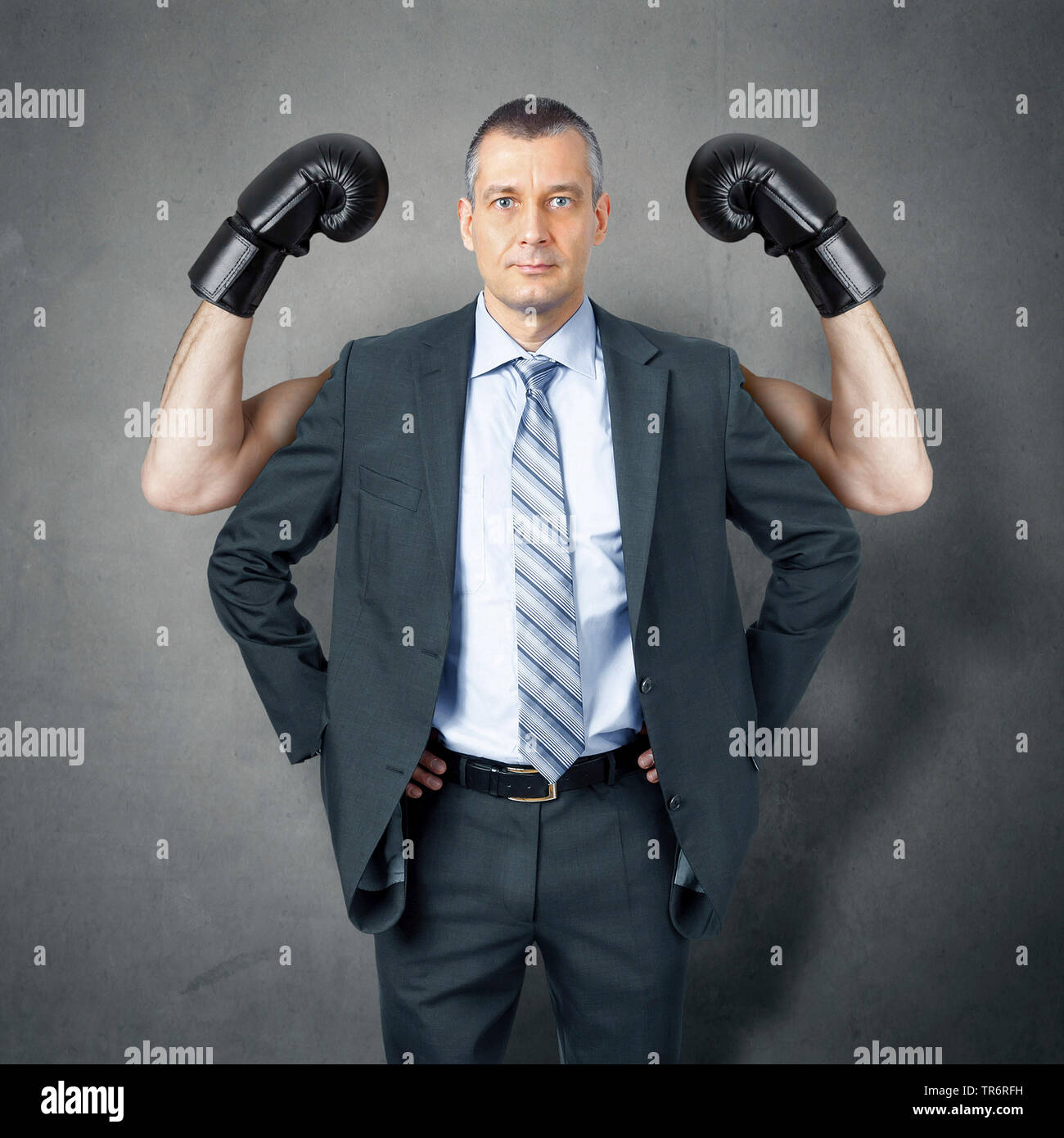 business man with boxing arm in the background, Germany Stock Photo - Alamy
