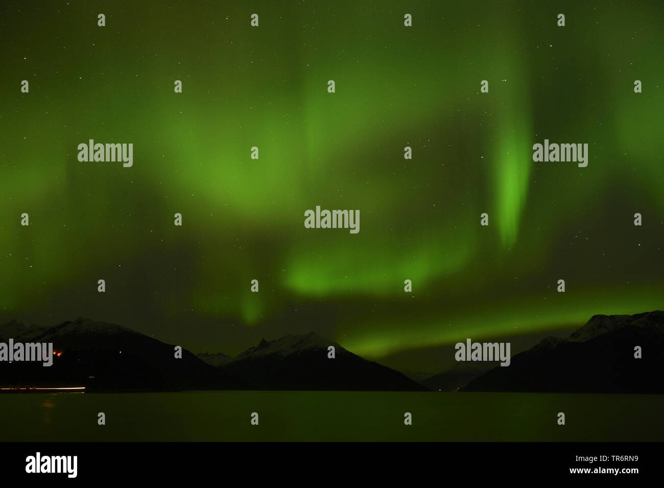 Chilkoot River in winter with polar light, USA, Alaska, Haines Alaska ...