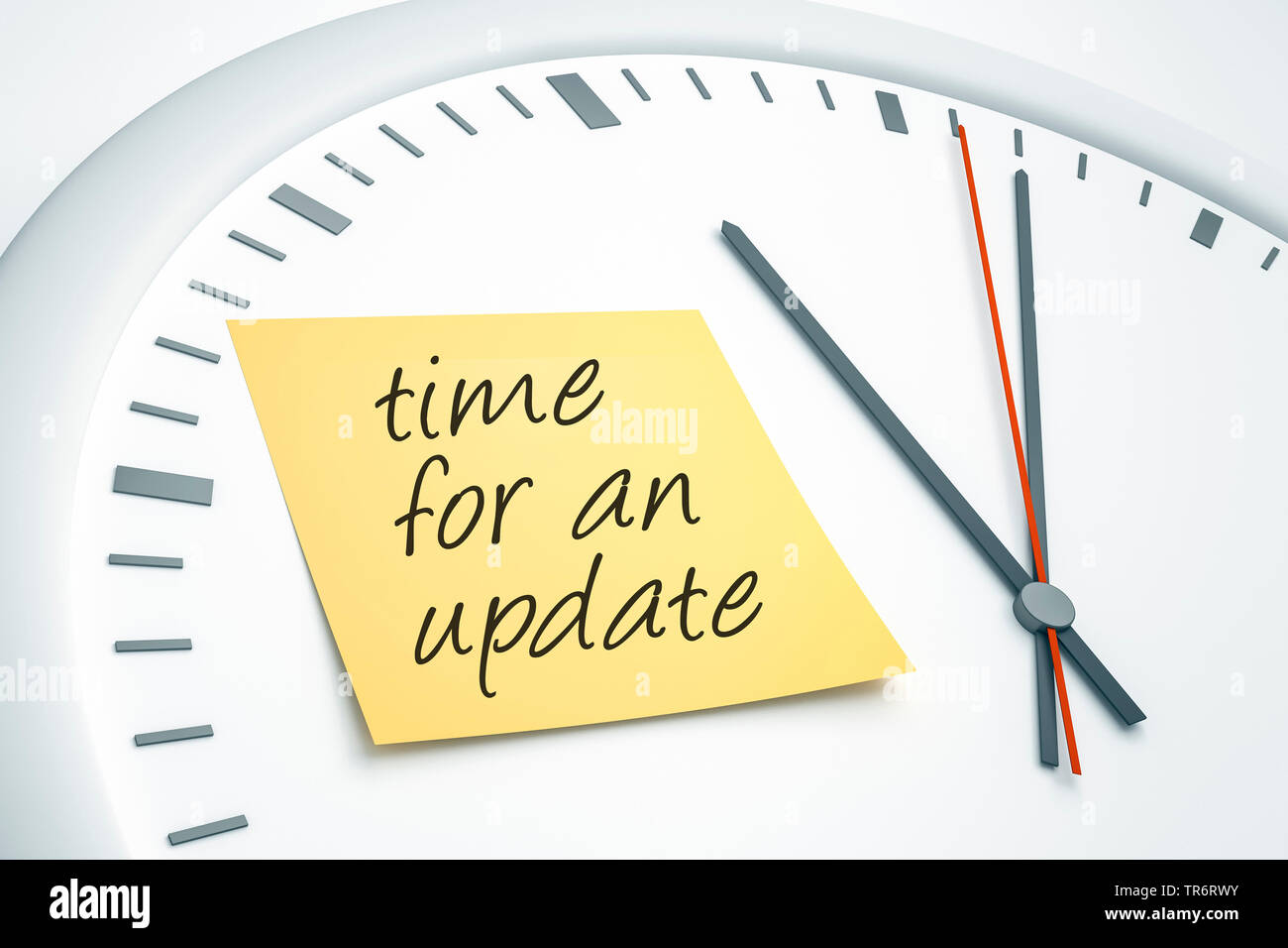 clock with pot-it and English title Time for an Update Stock Photo - Alamy