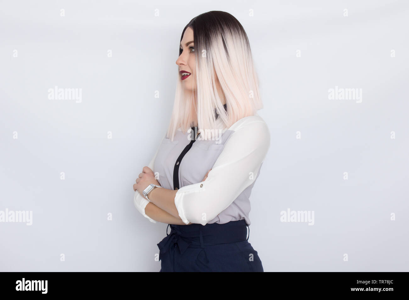 Image of successful blondhairy secretary woman standing in the office ...