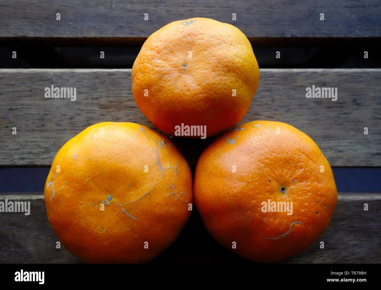 Three mandarins hi-res stock photography and images - Alamy