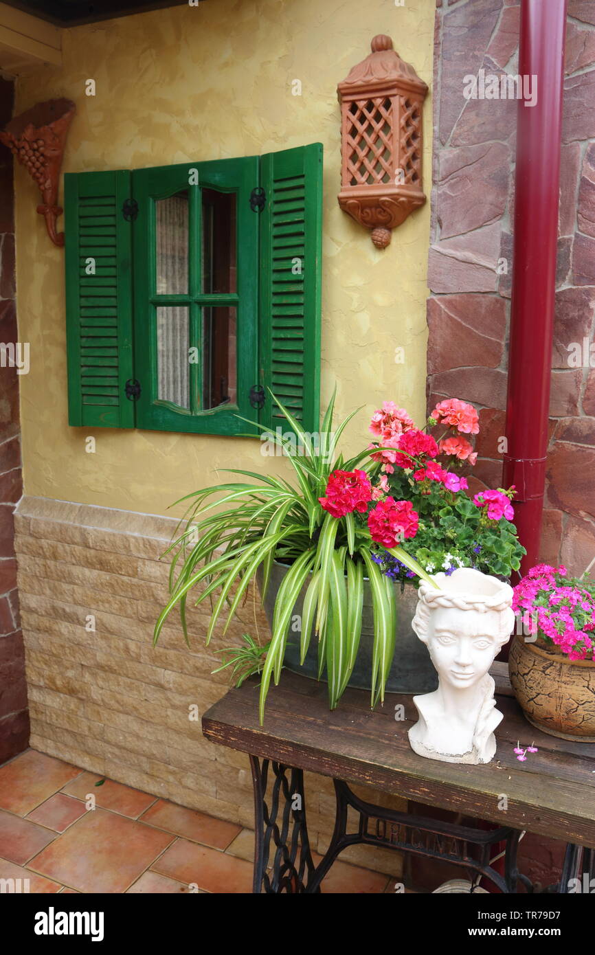 Plaster statue in the garden Stock Photo - Alamy