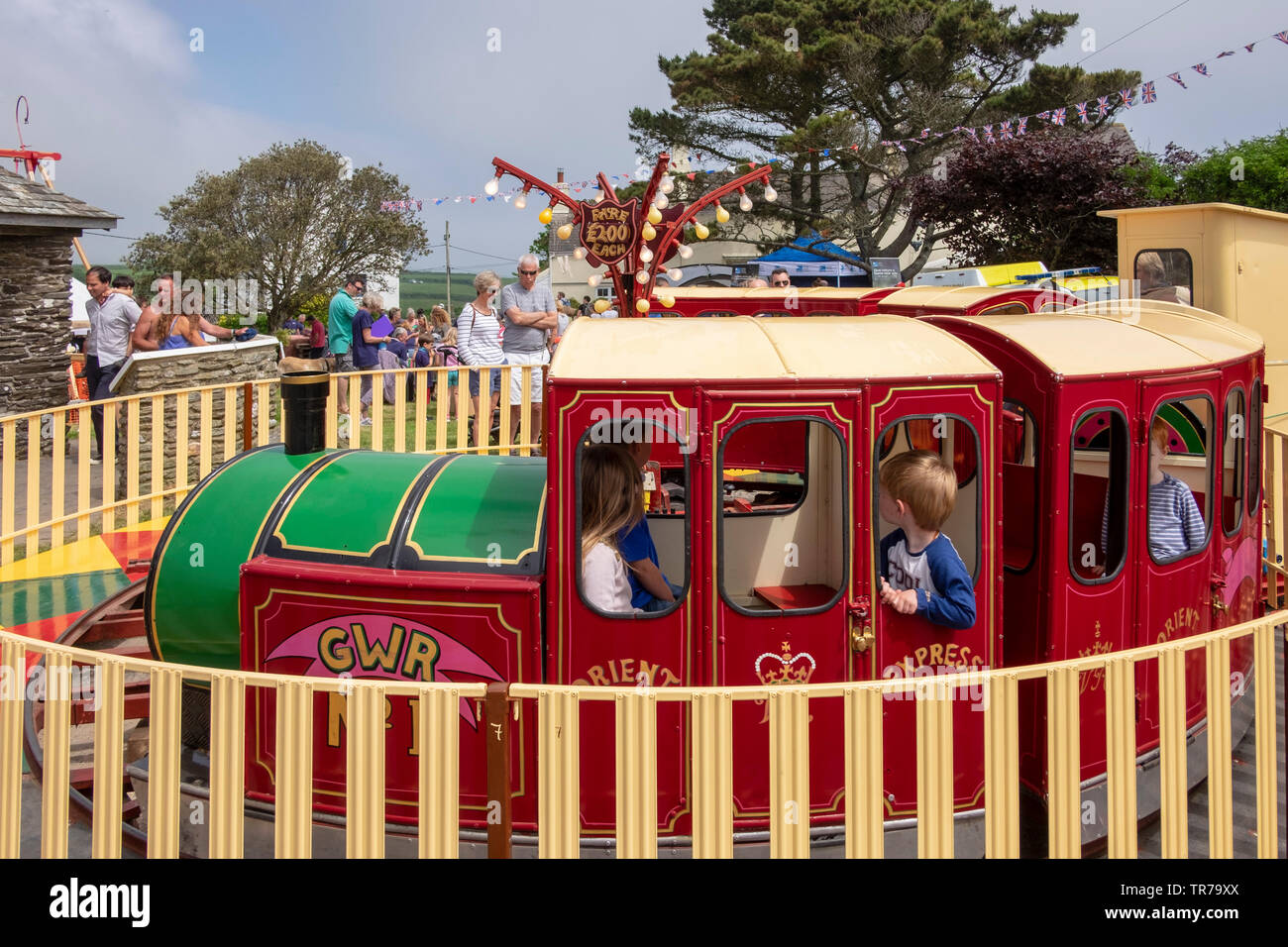 Old fashioned fairground rides at East Prawle fair, Devon Stock Photo ...