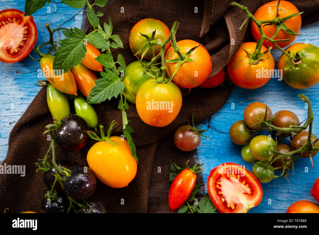 Fresh organic tomatoes set Stock Photo - Alamy
