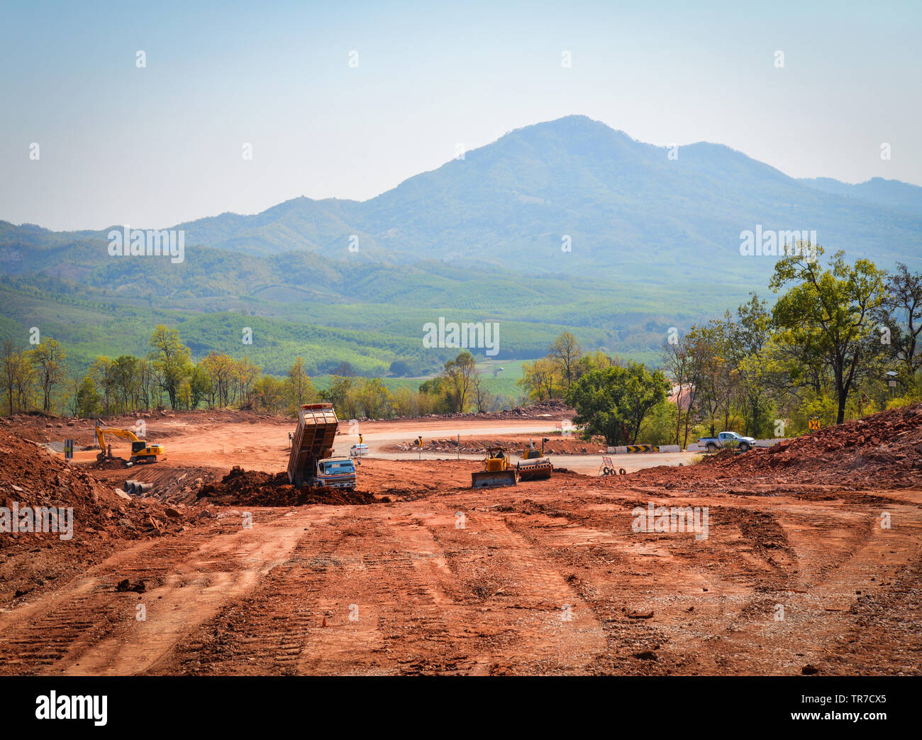 Road construction equipment and road Repair machine digging at the ...