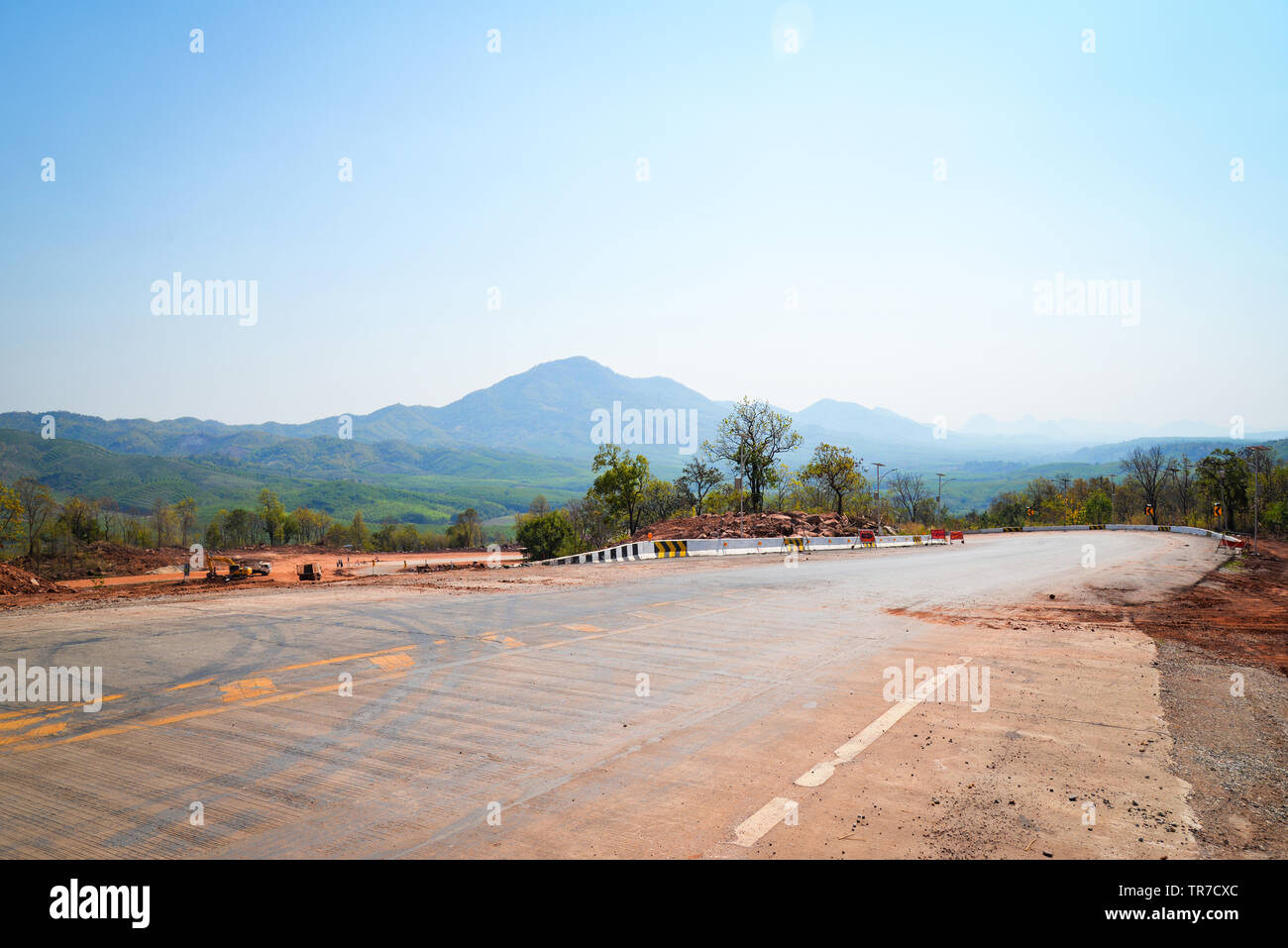 Road construction equipment and road Repair machine digging at the ...