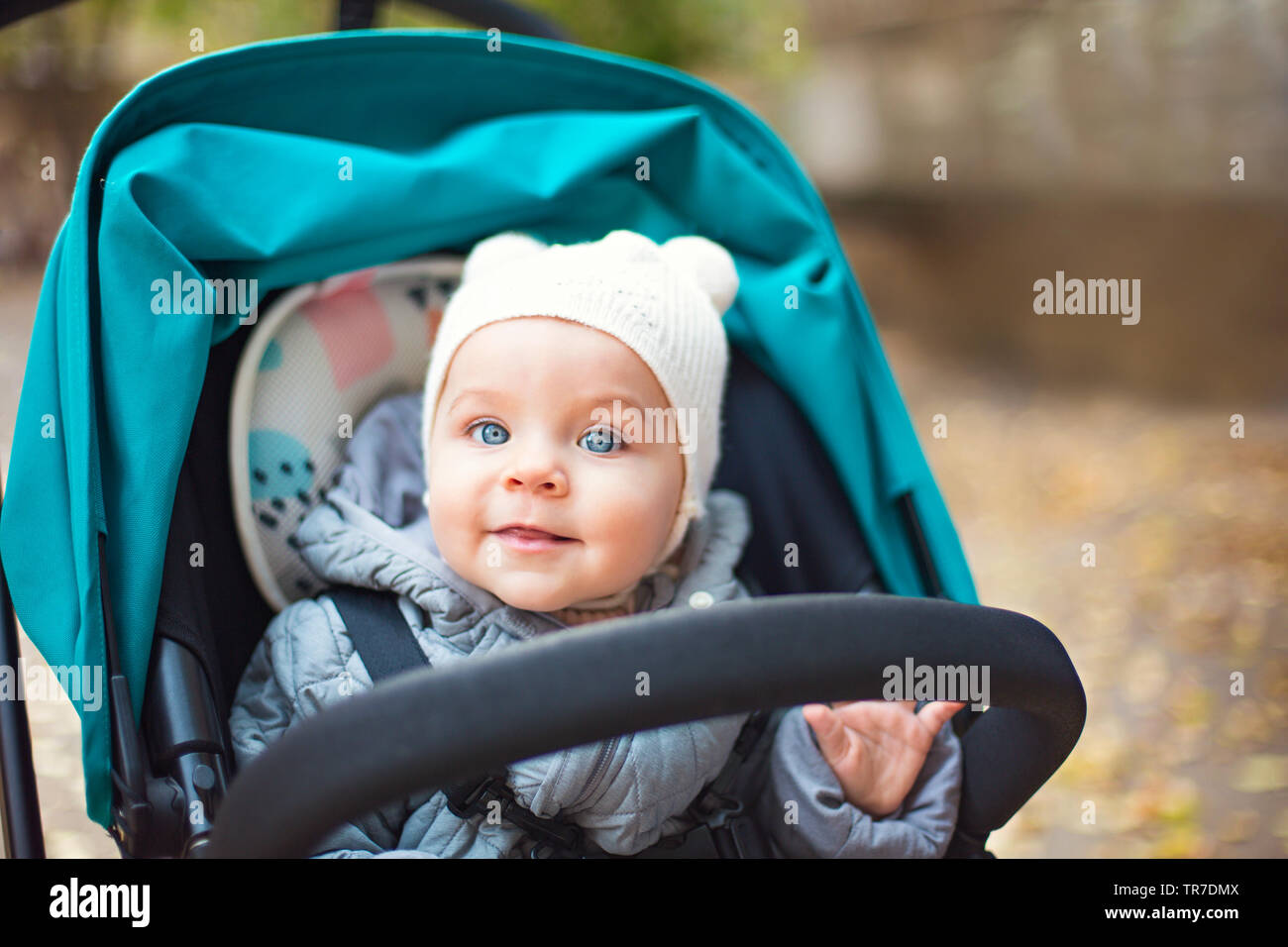 Female with baby pushchair hi-res stock photography and images - Alamy
