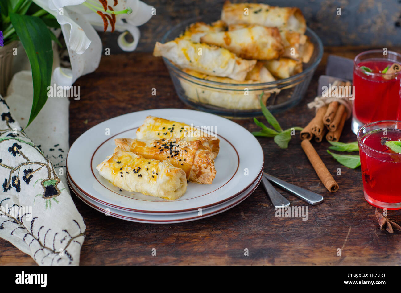 Two glass of Turkish Sherbet and slices of freshly baked homemade borek ...