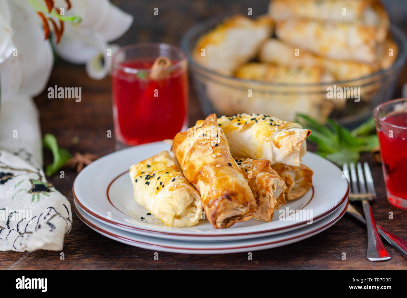 Two glass of Turkish Sherbet and slices of freshly baked homemade borek ...