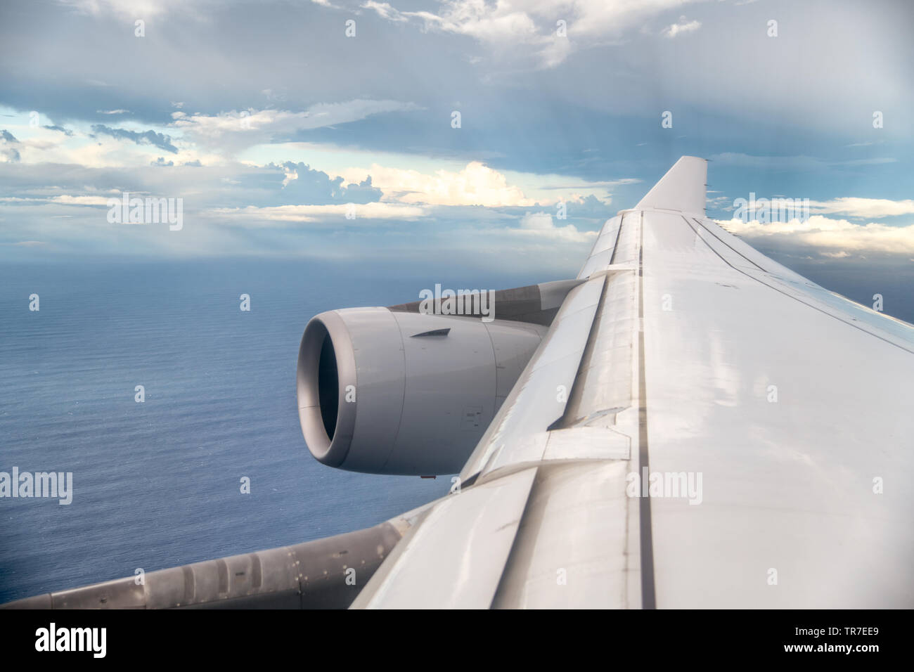 Airplane wing as seen from aircraft window interior Stock Photo - Alamy