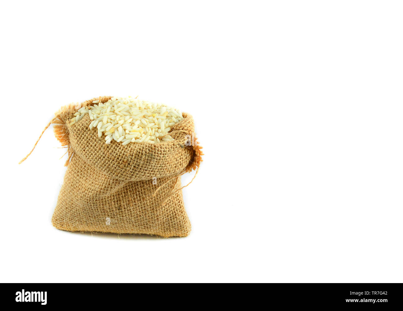 rice in sack isolated on white background Stock Photo - Alamy