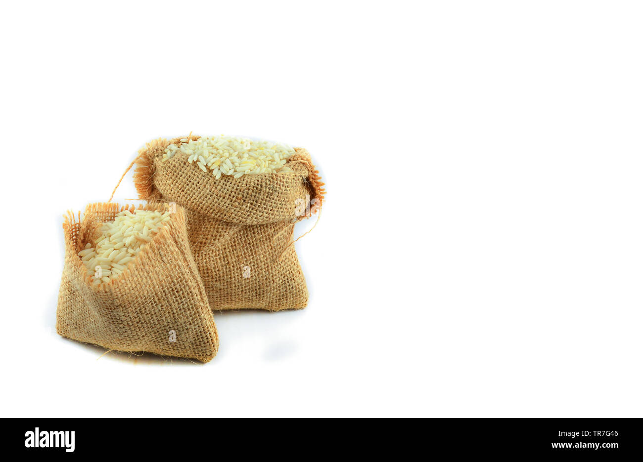 White rice in burlap sack Cut Out Stock Images & Pictures - Alamy