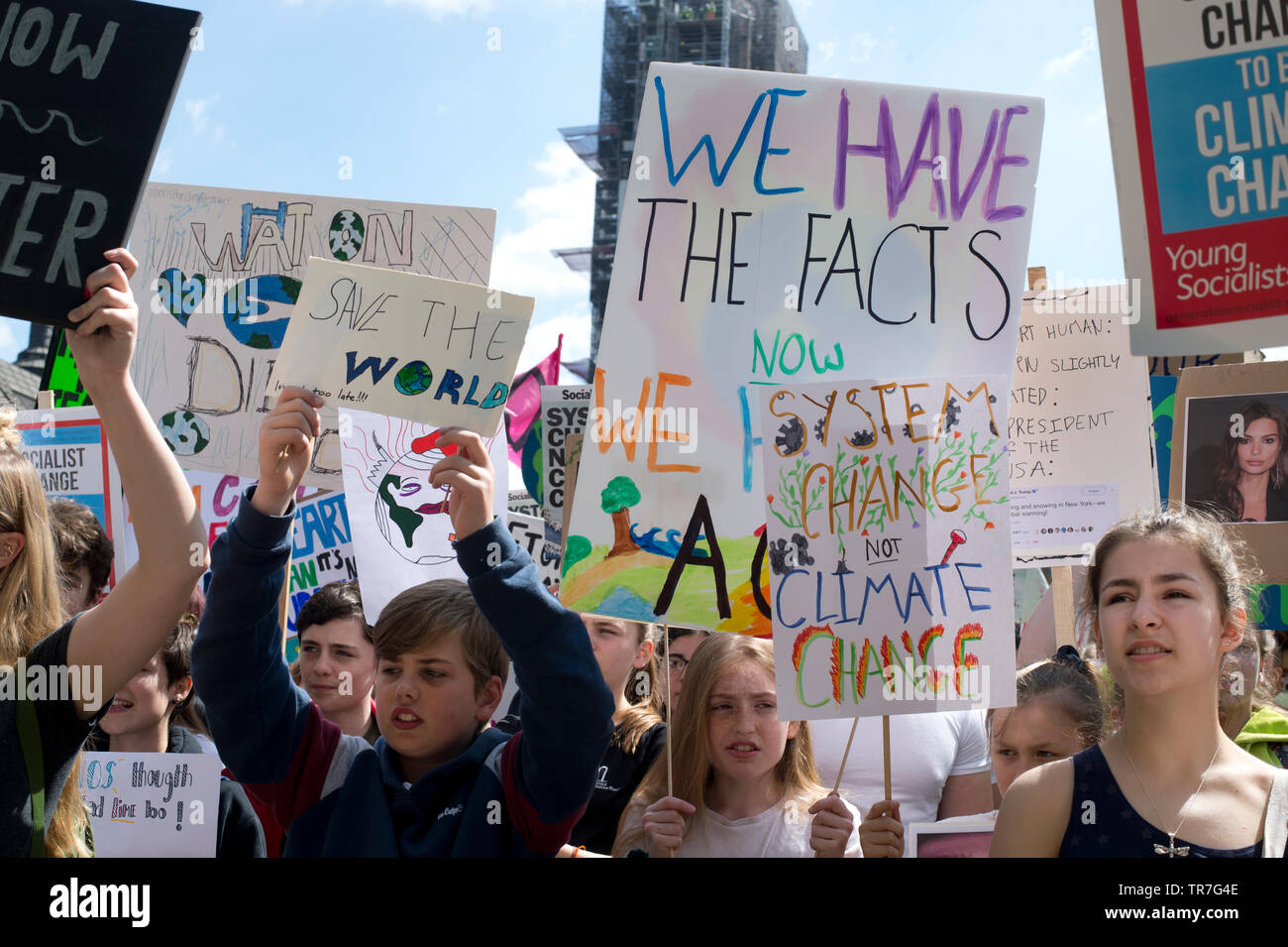 School Climate Strike, London, England, UK. A group with home-made ...