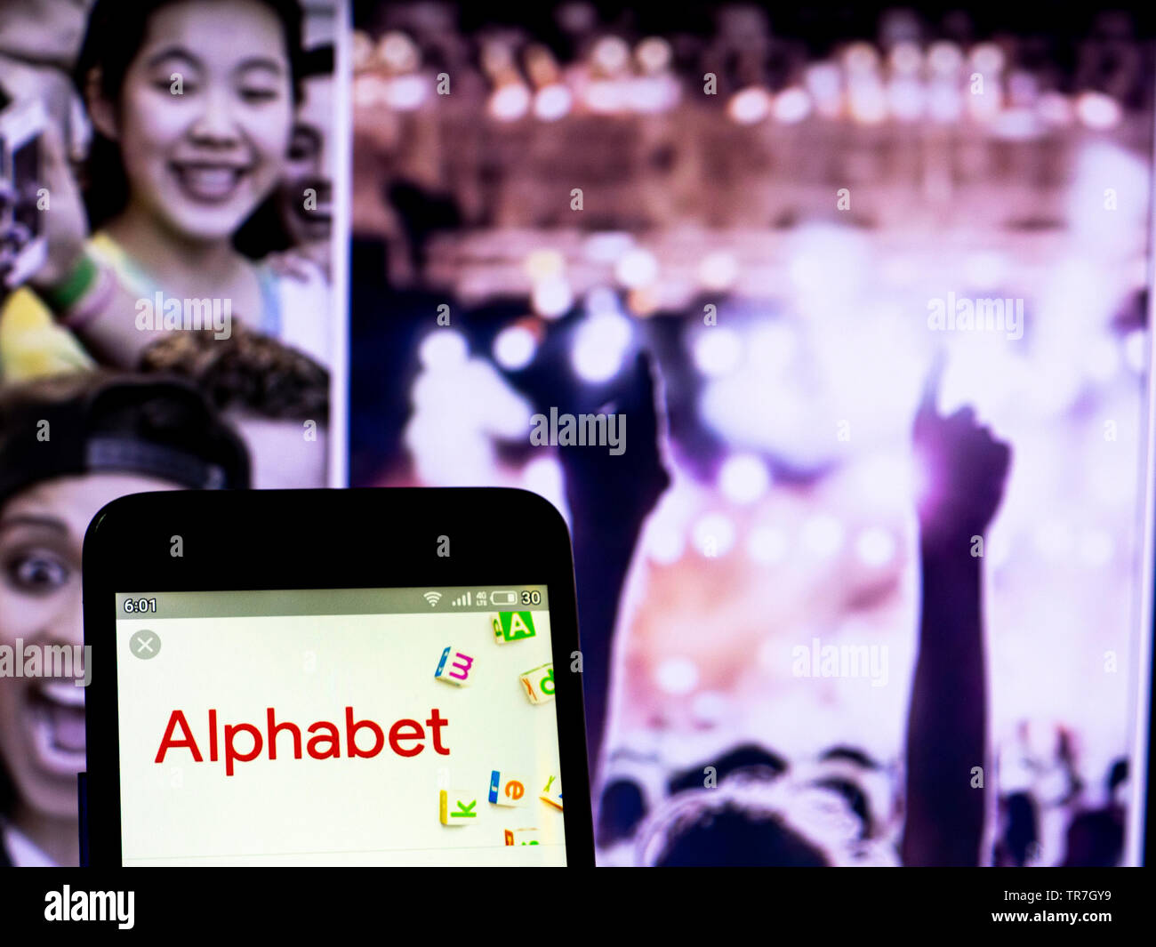 In this photo illustration the Alphabet Inc. logo is seen displayed on ...