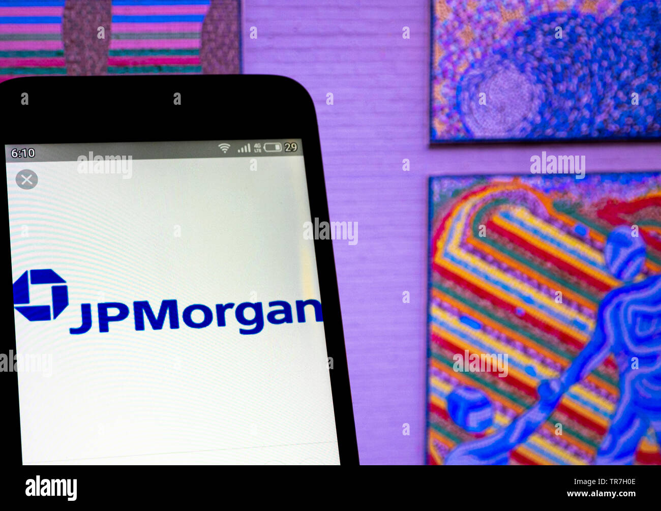 In this photo illustration the JPMorgan Chase logo is seen displayed on ...