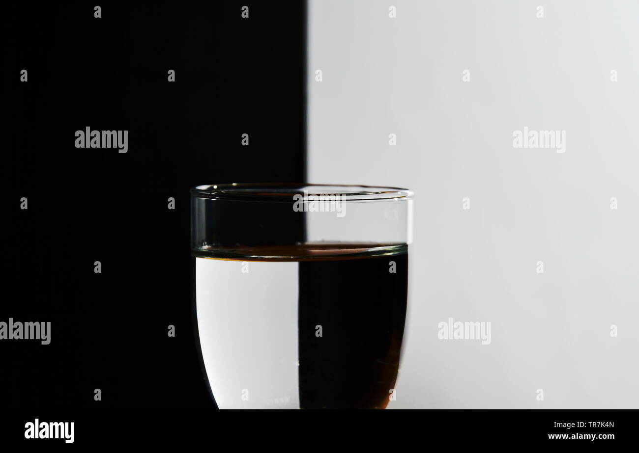 refraction on glass water in black and white background Stock Photo - Alamy