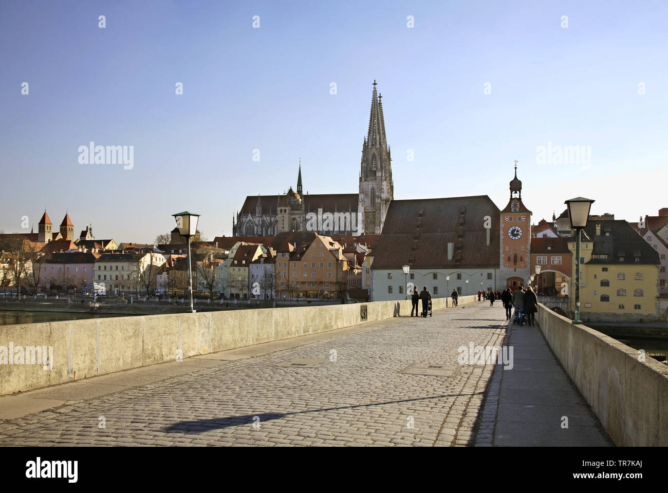 Stone bridge over danube and old town with cathedral hi-res stock ...