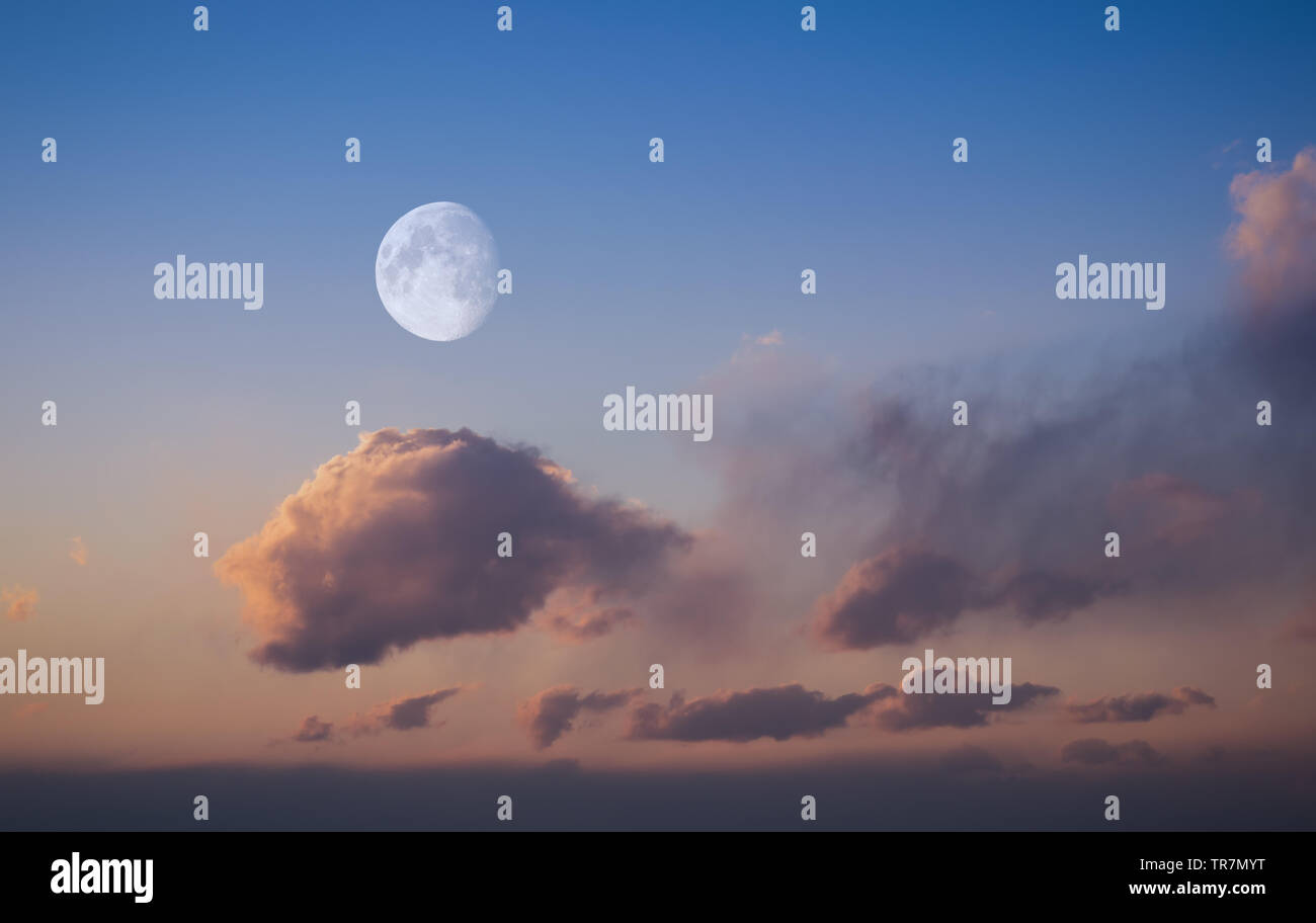 Moon with sunset sky background Stock Photo - Alamy
