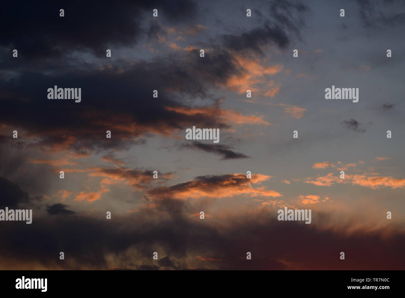 Dramatic sunset sky with dark clouds.Dramatic sunset sky with dark ...