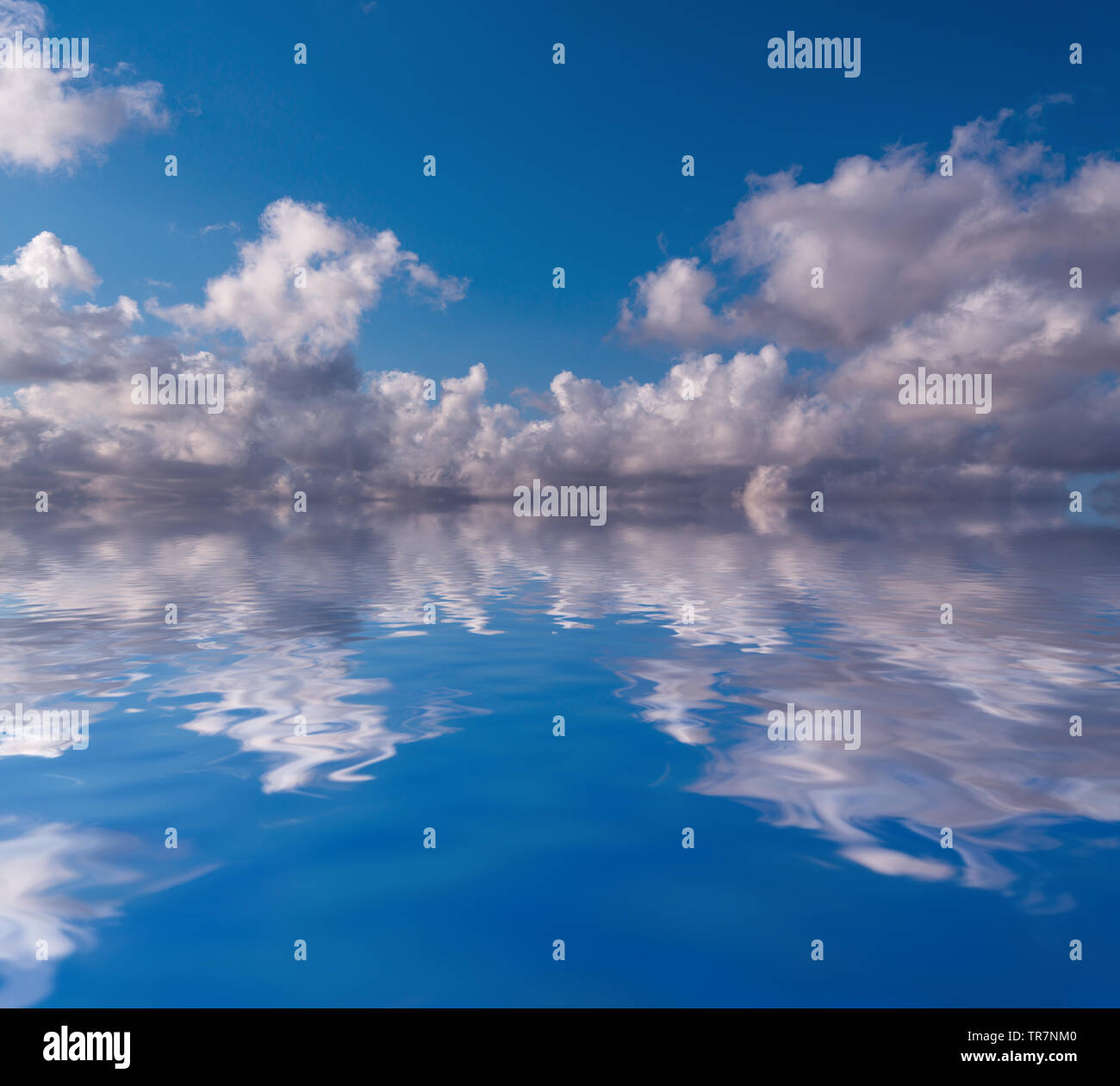 Clouds reflecting in the water Stock Photo - Alamy