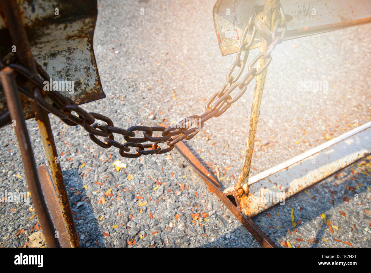 Old steel chain locked door metal fence no entry on outdoors park Stock ...