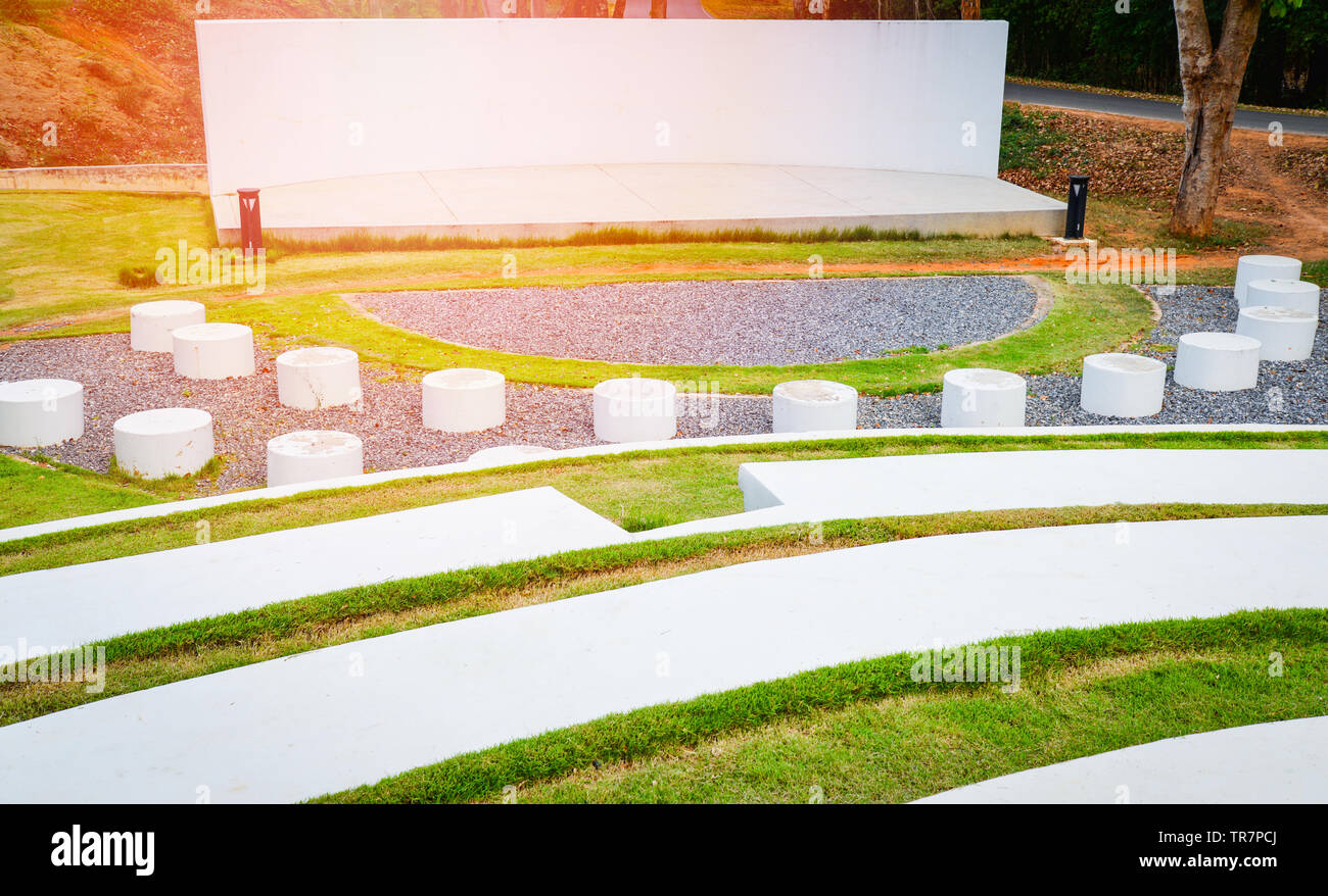 Stage outdoors / stage show with Park bench Cement and pathway in the ...