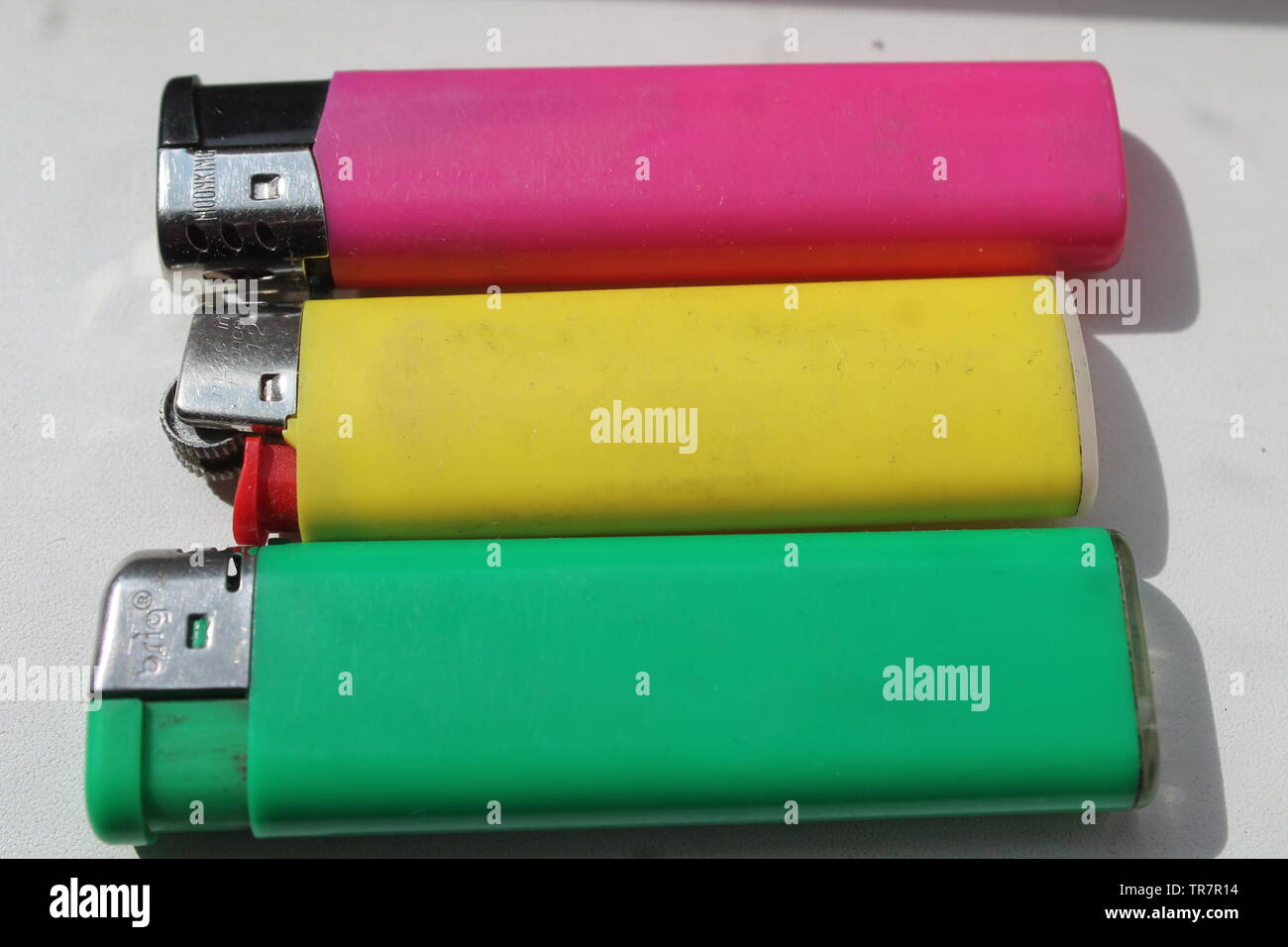 plastic colorful fire lighters for daily use Stock Photo - Alamy