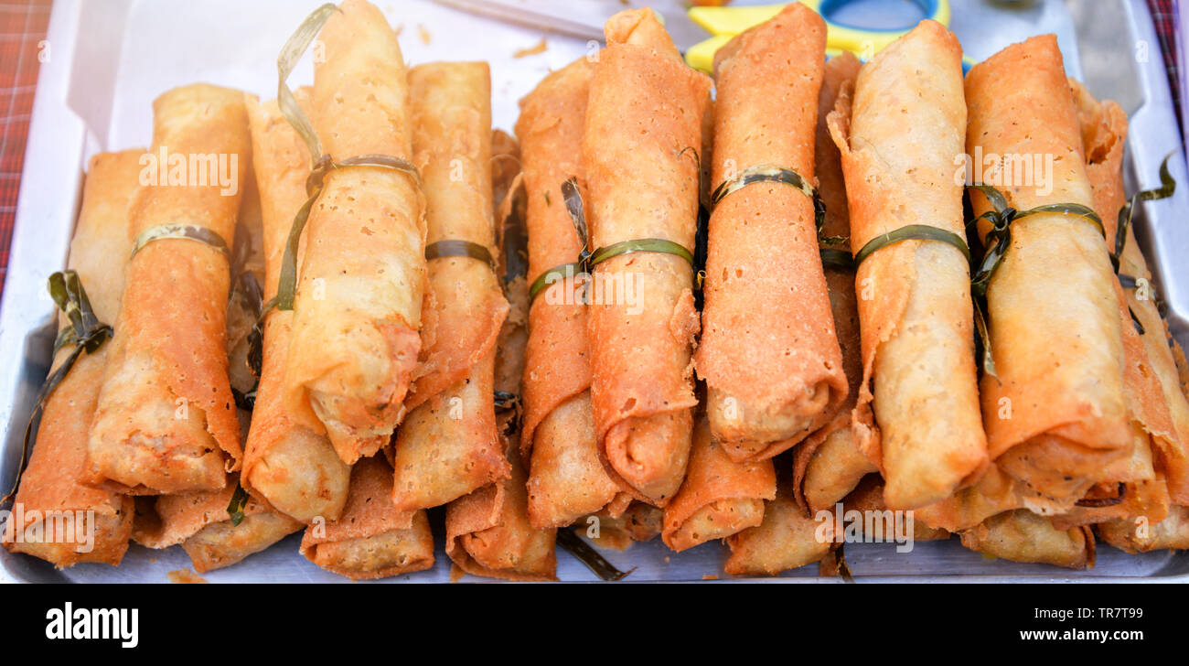Fried Chinese traditional Spring rolls in street food market Stock ...