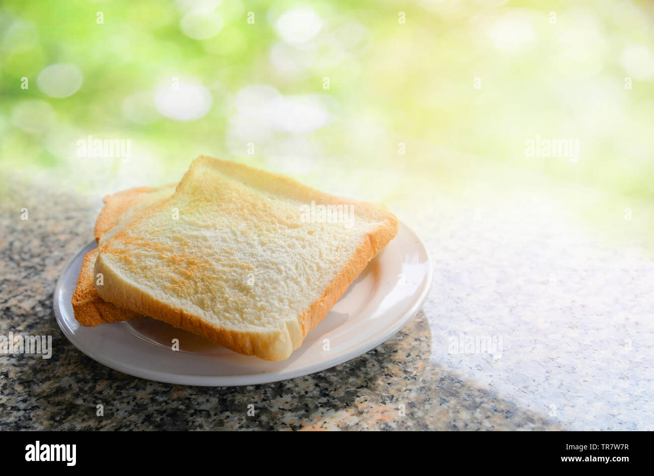 Morning food breakfast slice toast bread on white plate nature green ...