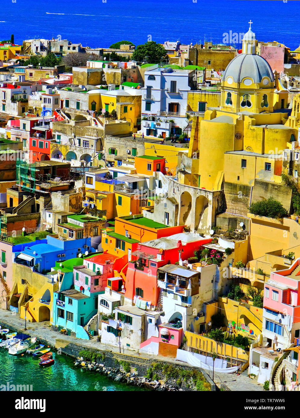 View of the colorful houses at the Port of Corricella in Procida Island ...