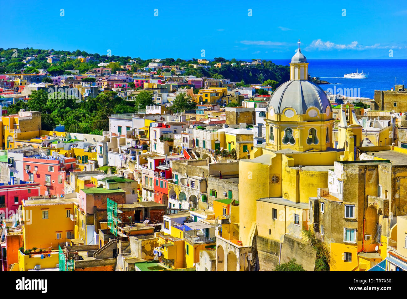 View of the colorful houses at the Port of Corricella in Procida Island ...