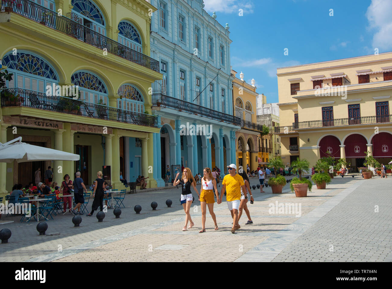 Tourists walk across the city's famous Plaza Vieja (main square ...